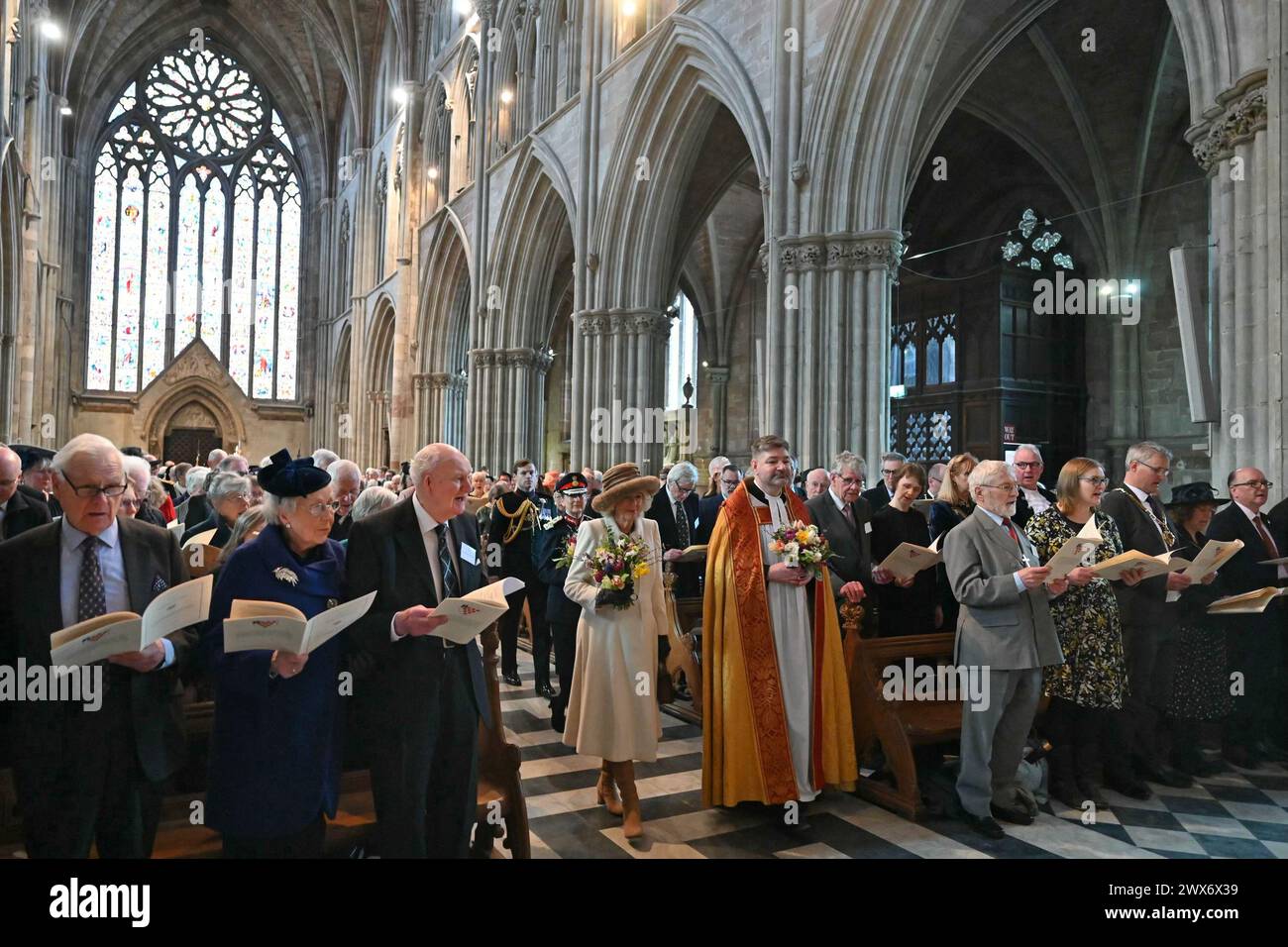 Queen Camilla walks with interim Dean of Worcester Cathedral, Reverend Canon Stephen Edwards at ...
