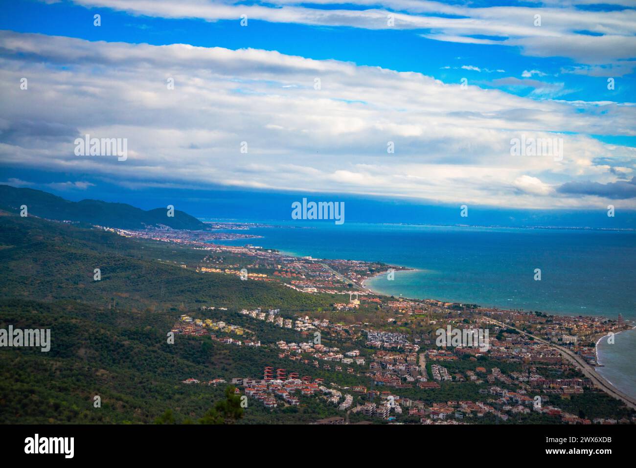 A serene coastal town, where charming houses line the beach and a ...