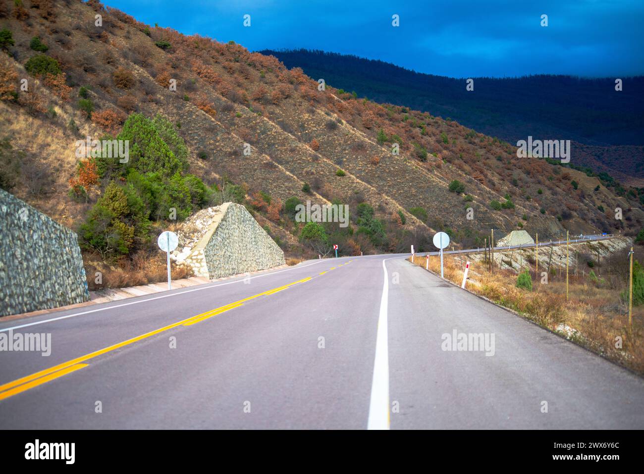 Detailed asphalt road profile: A closeup view showcasing the texture ...