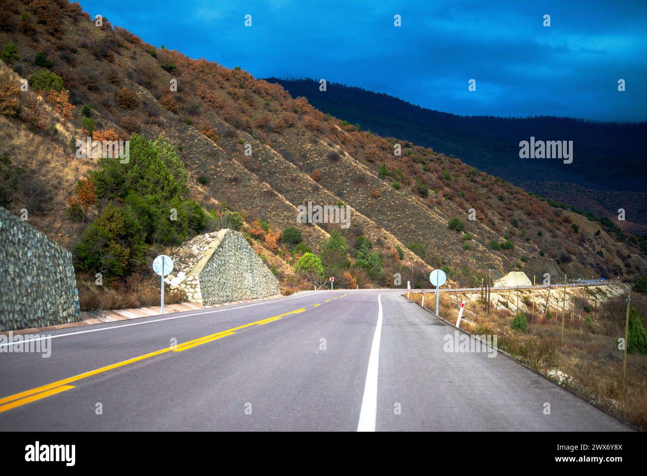 Detailed asphalt road profile: A closeup view showcasing the texture ...