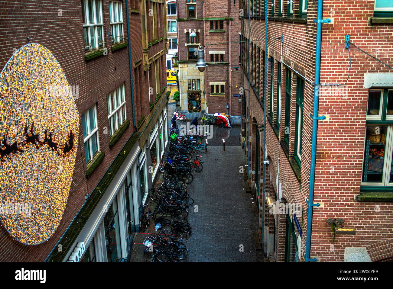 Amsterdam's buildings and streets blend picturesque canals, historic ...