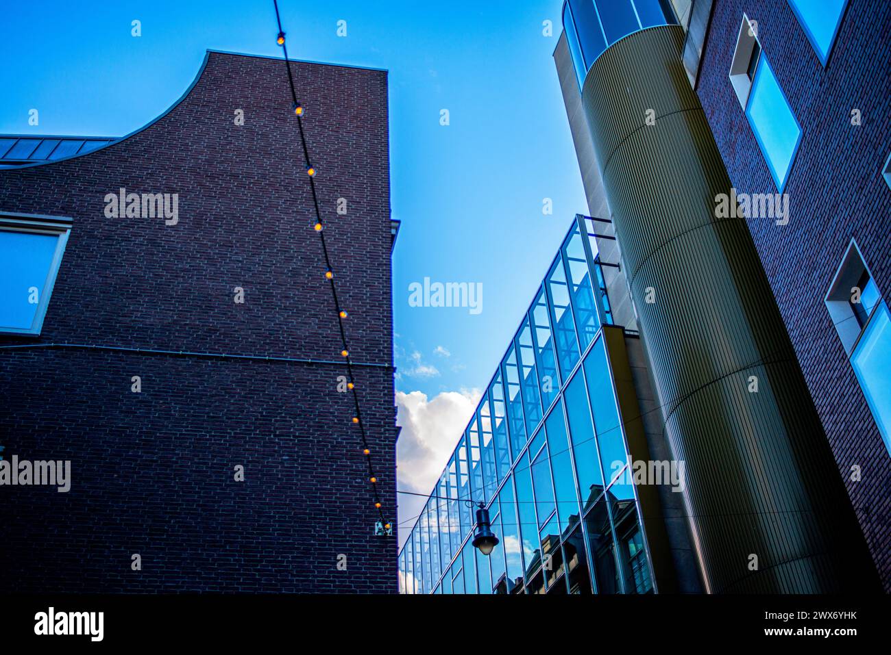 Amsterdam's buildings and streets blend picturesque canals, historic ...