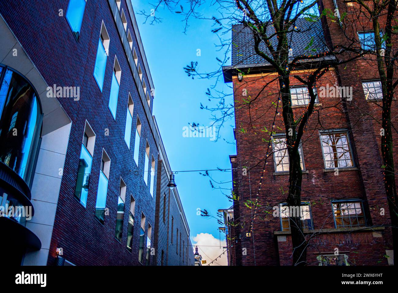 Amsterdam's buildings and streets blend picturesque canals, historic ...
