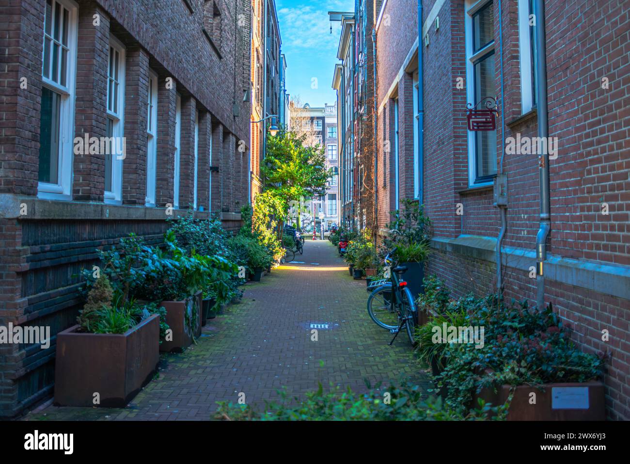 Amsterdam's buildings and streets blend picturesque canals, historic ...