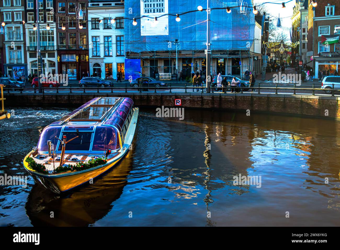 Embark on a picturesque journey through Amsterdam's canals aboard a ...