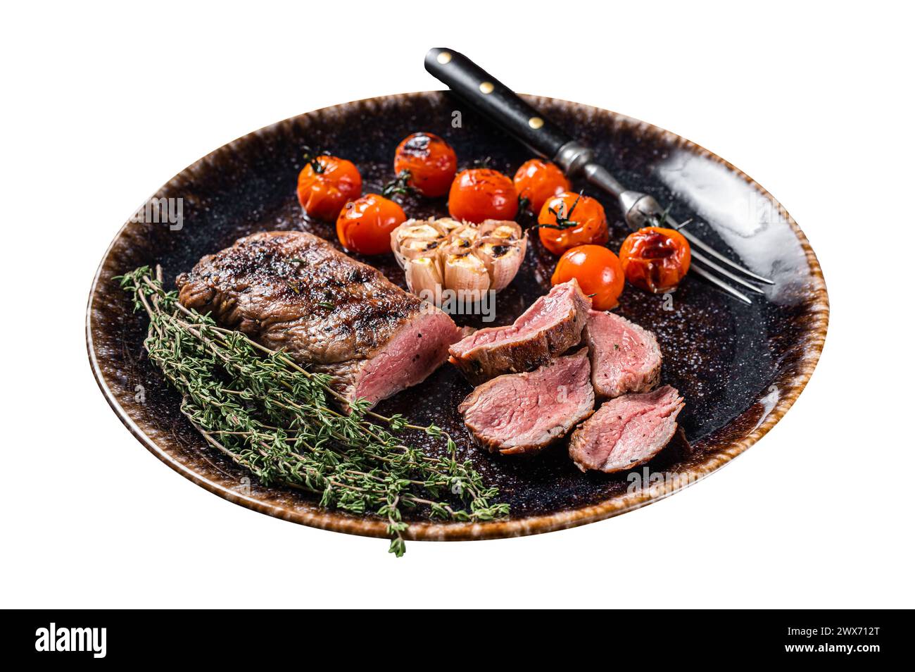 Lamb sirloin fillet meat in plate with grilled tomato, mutton grilled ...