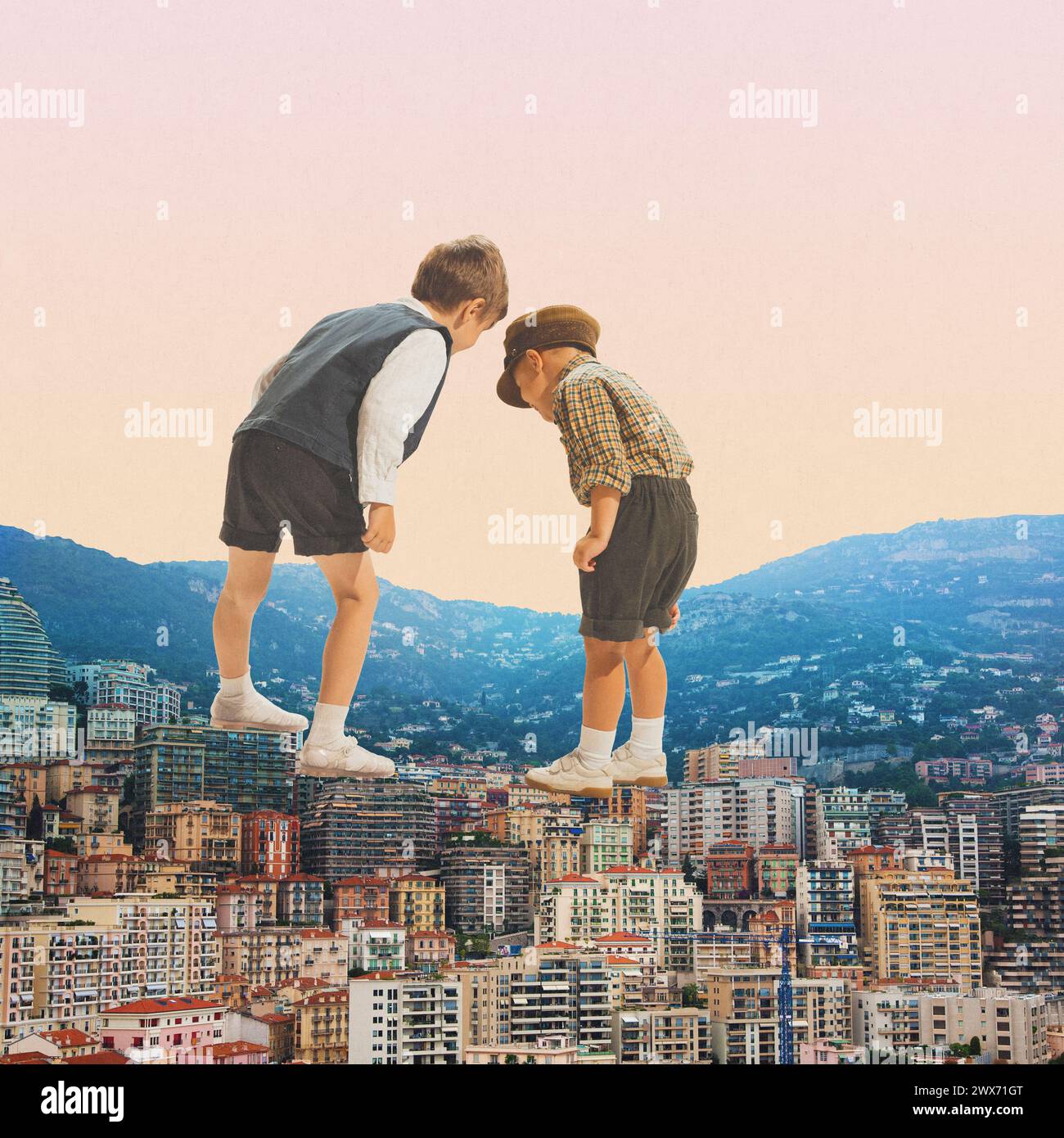 Two boys, little children standing above city and mountain landscape ...