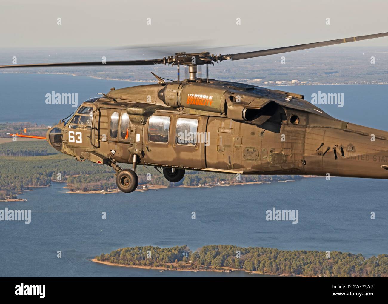 Instructor pilots at the U.S. Naval Test Pilot School (USNTPS) fly a UH ...