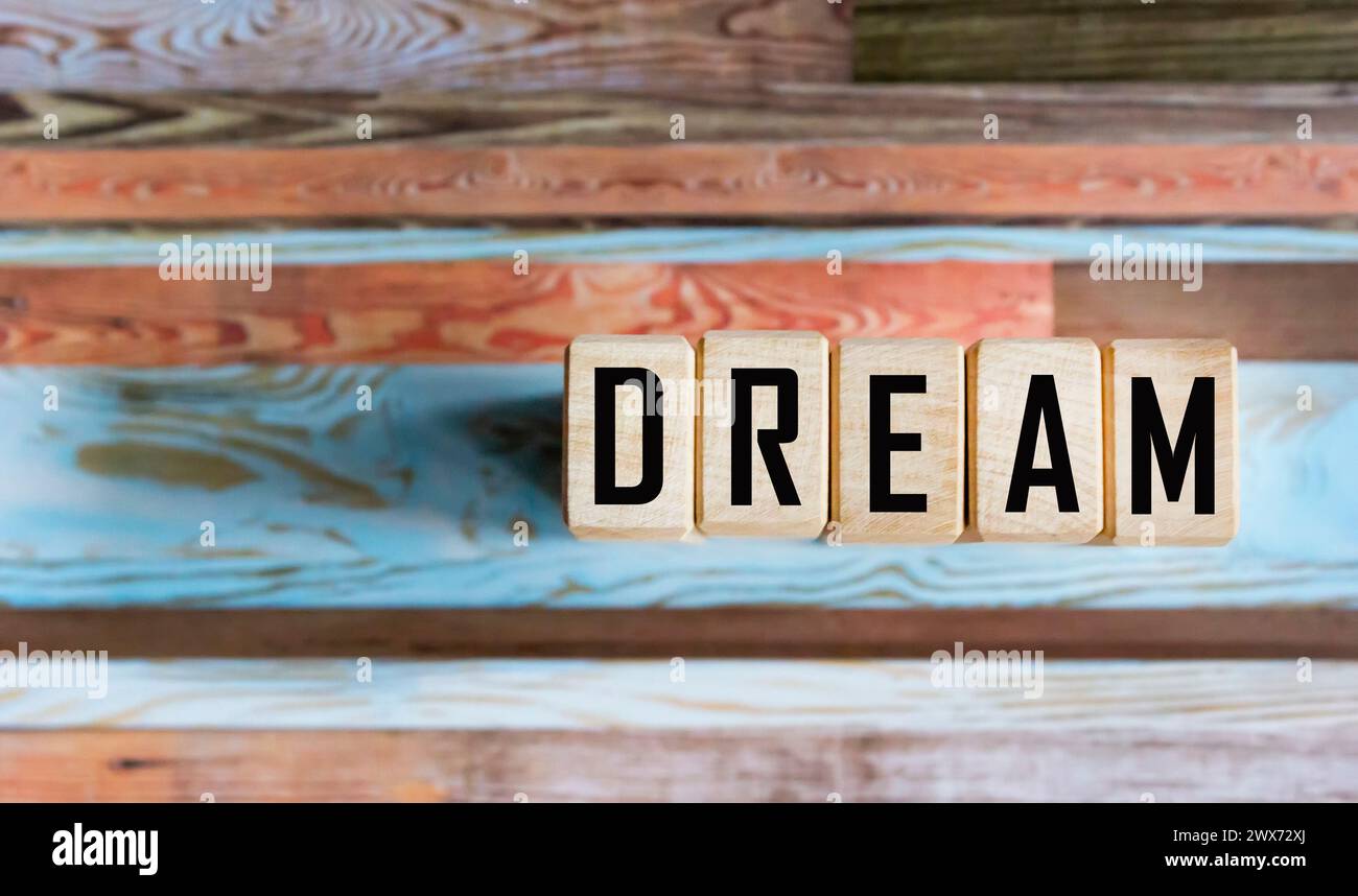 The word Dream written on wooden blocks and vintage background Stock ...