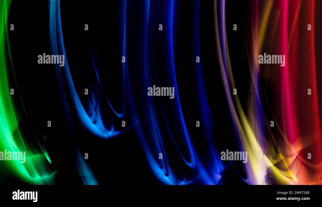 Abstract colorful irregular lines on black background and wall texture ...