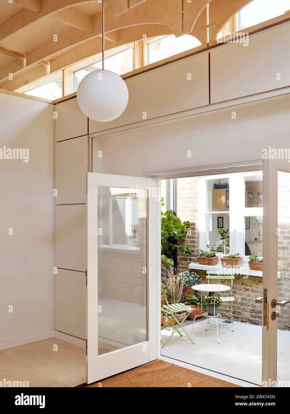 Hub's entrance doors opened to courtyard. Pitzhanger Hub, London ...