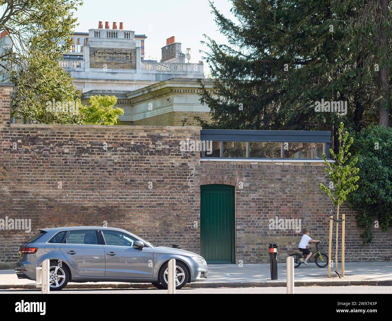 Side entrance to hub. Pitzhanger Hub, London, United Kingdom. Architect ...