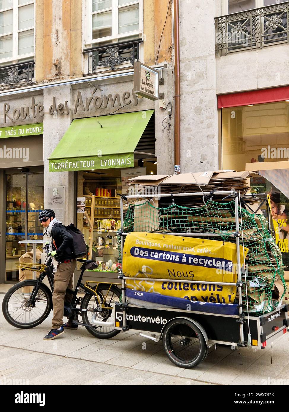 Bicycle with a trailer full of cardboard boxes to recycle, soft mean of ...