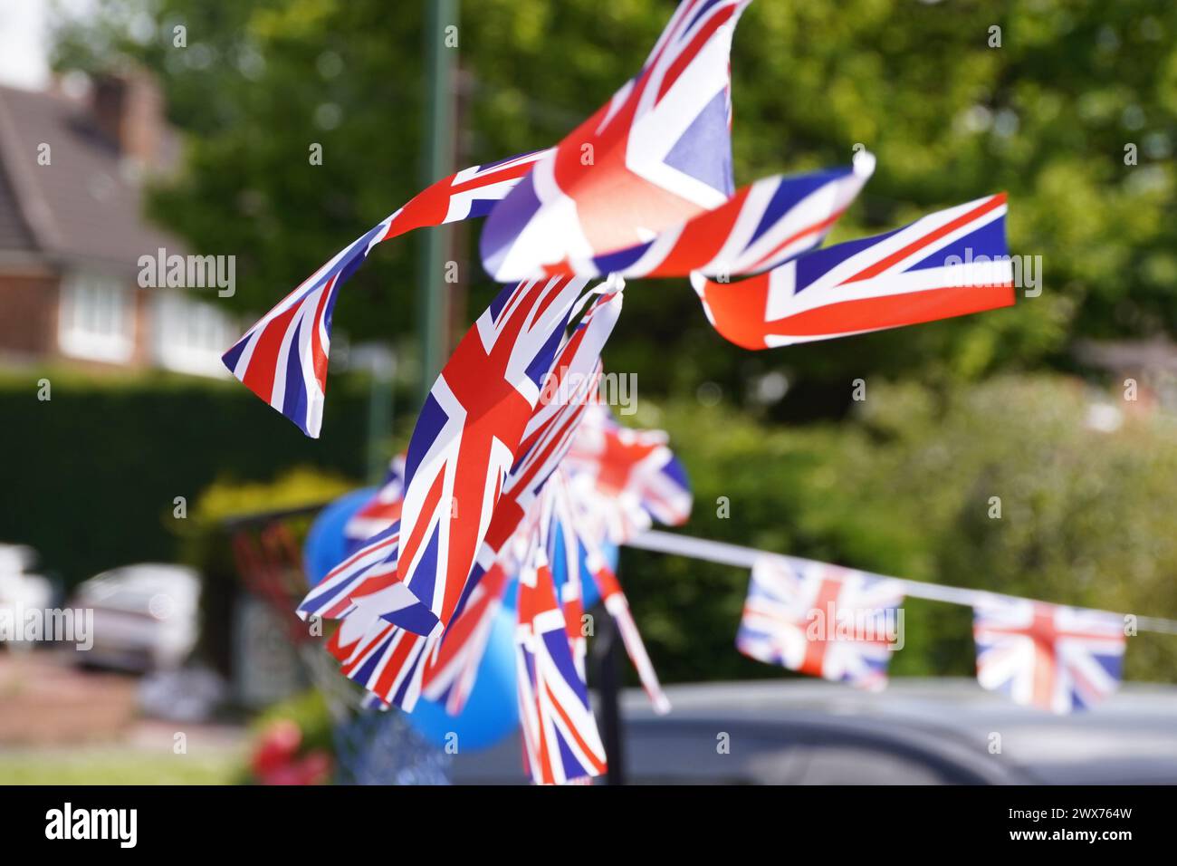 British afternoon in the garden with flags flying like it's a jubilee ...