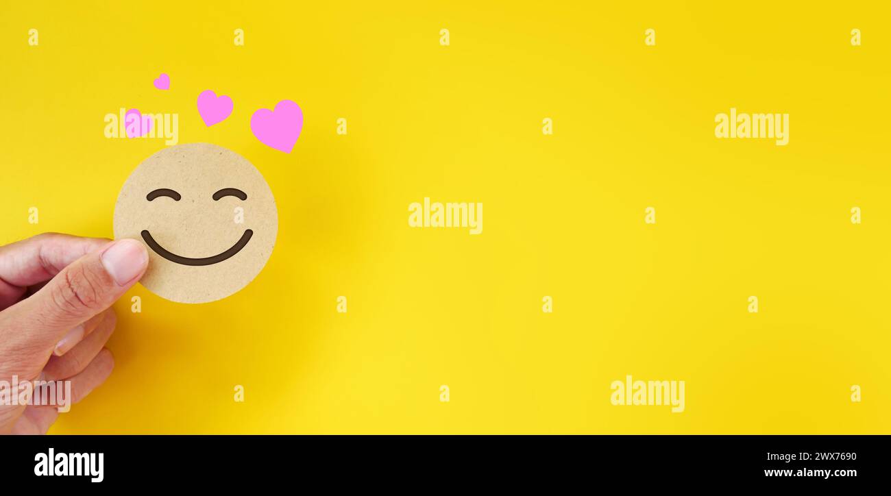 Hand holding happy smile face card. Concept of growth mindset, positive ...
