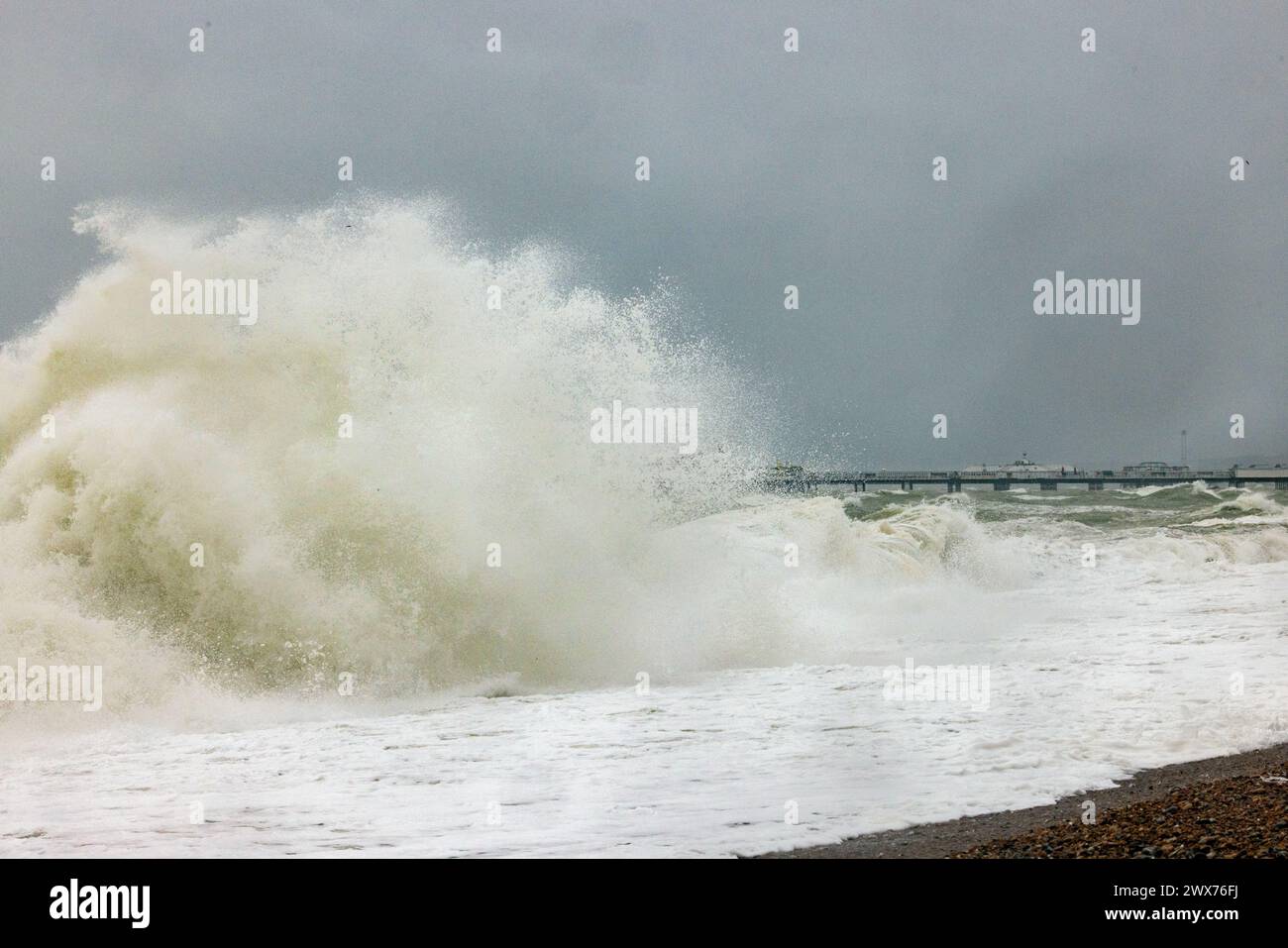 Big waves hitting beach in hi-res stock photography and images - Alamy