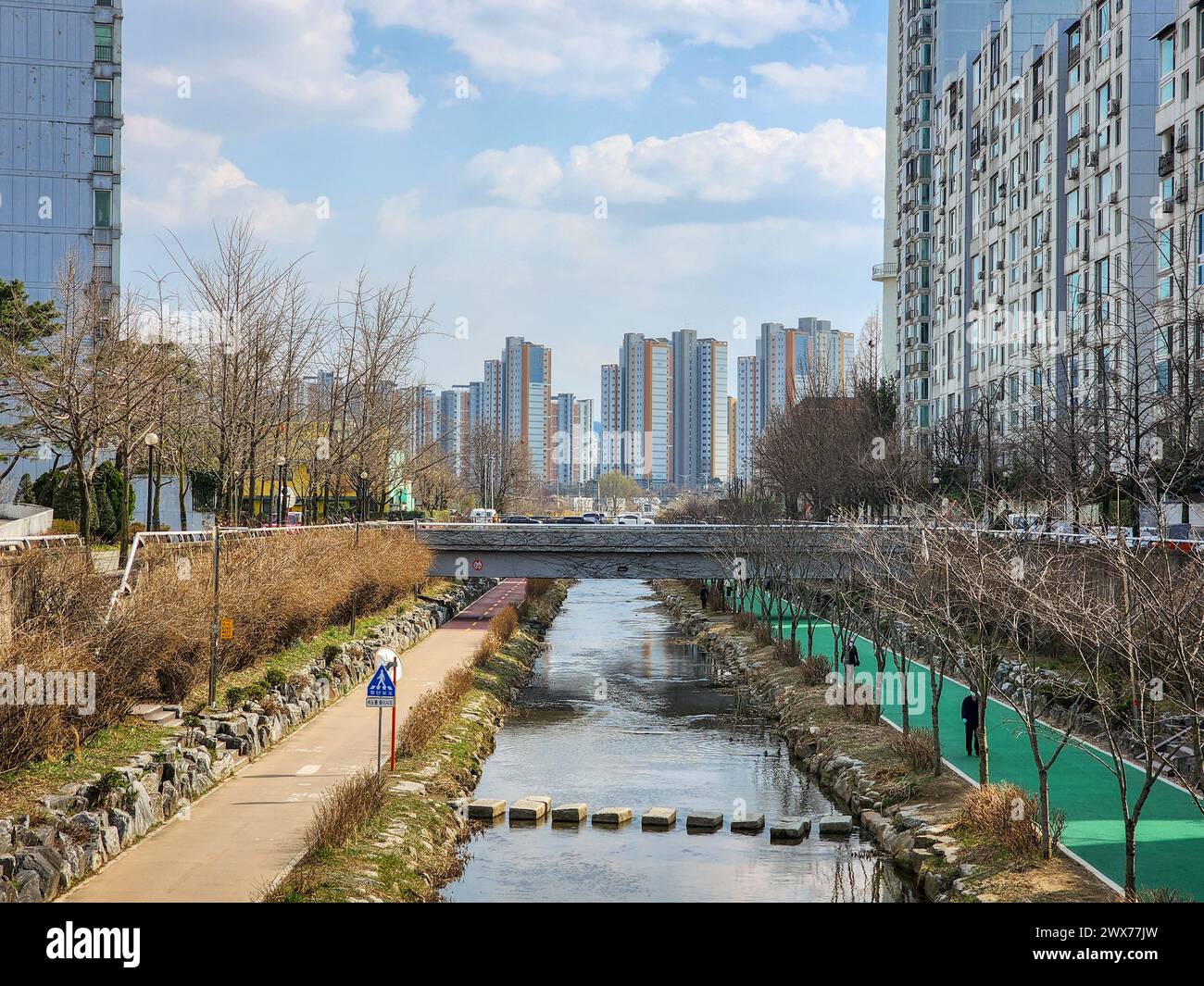 A stream and walking path in an apartment complex in Seoul, South Korea ...