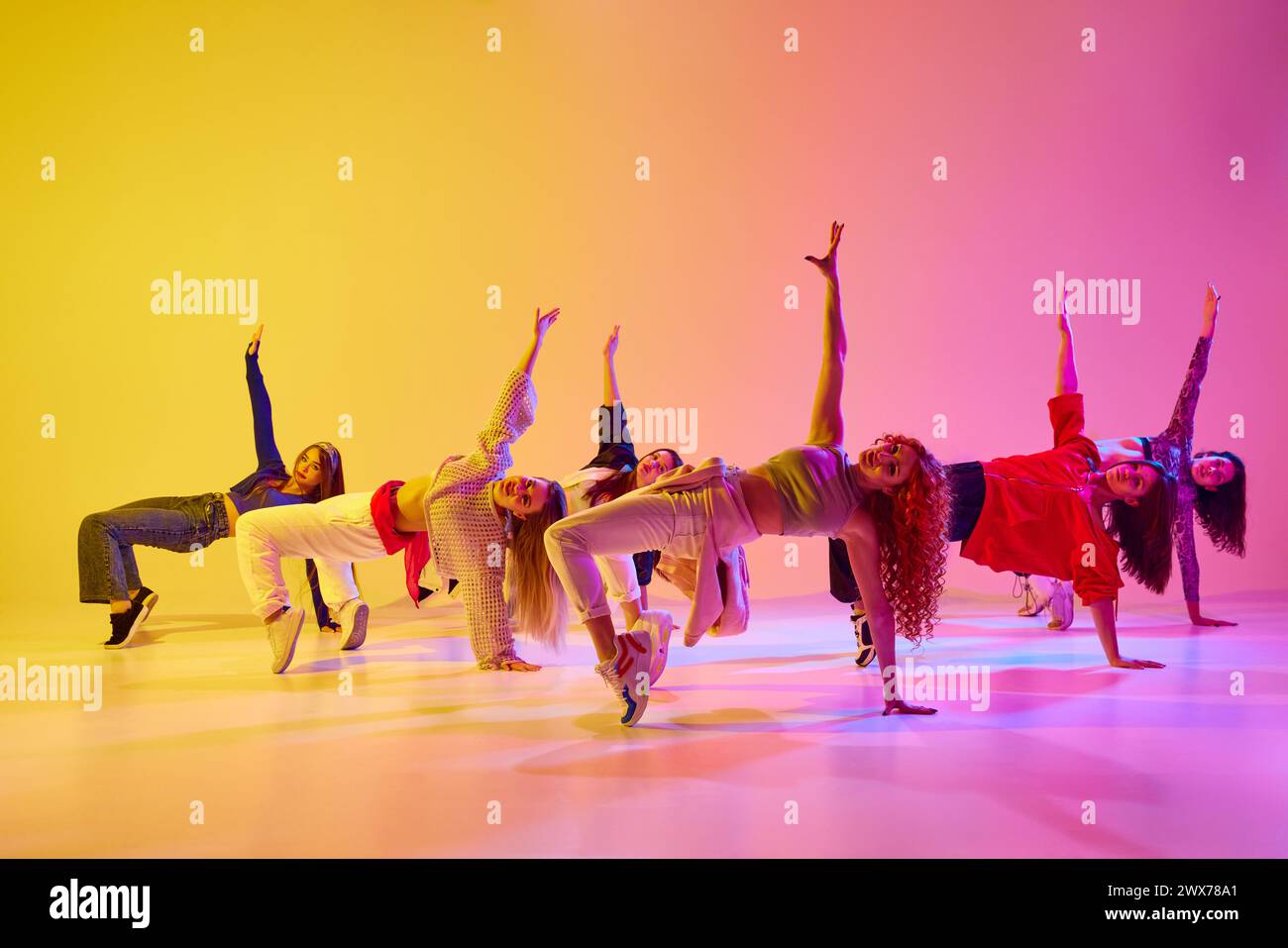 Dynamic pose. Young women dancing contemp, performing modern dance ...