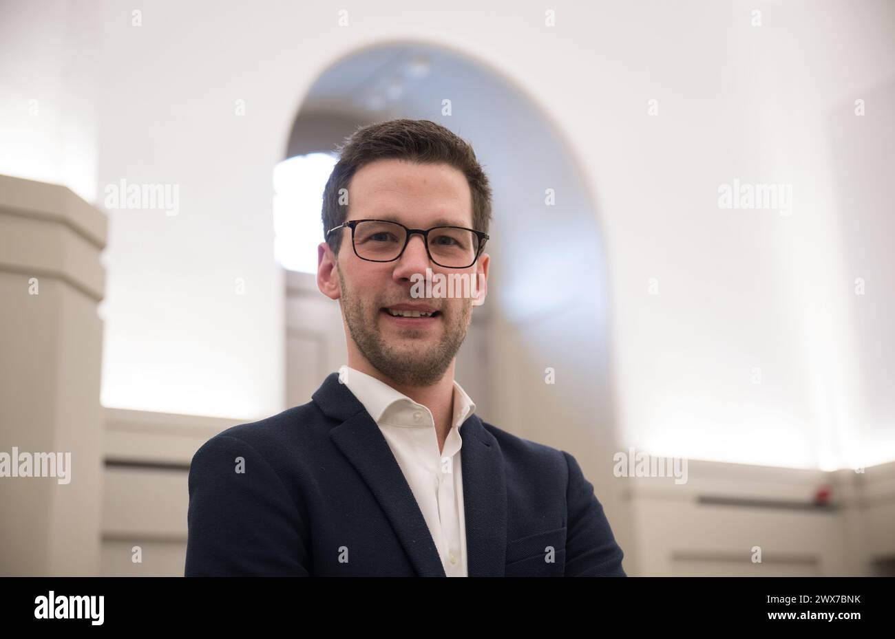 Potsdam, Germany. 28th Mar, 2024. Pastor Jan Kingreen stands in the ...