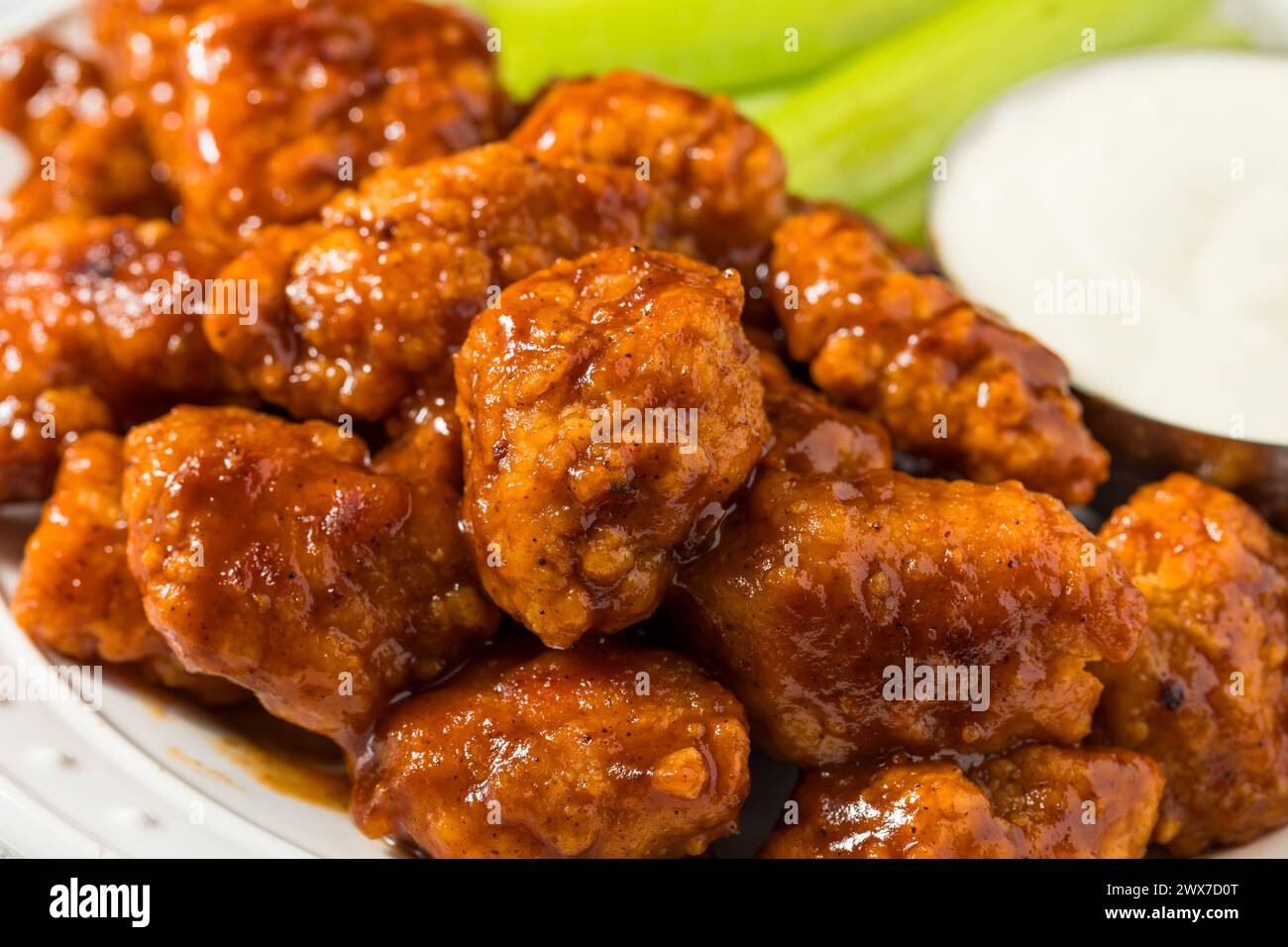 Spicy Boneless Barbecue Chicken Wings with Ranch and Celery Stock Photo ...