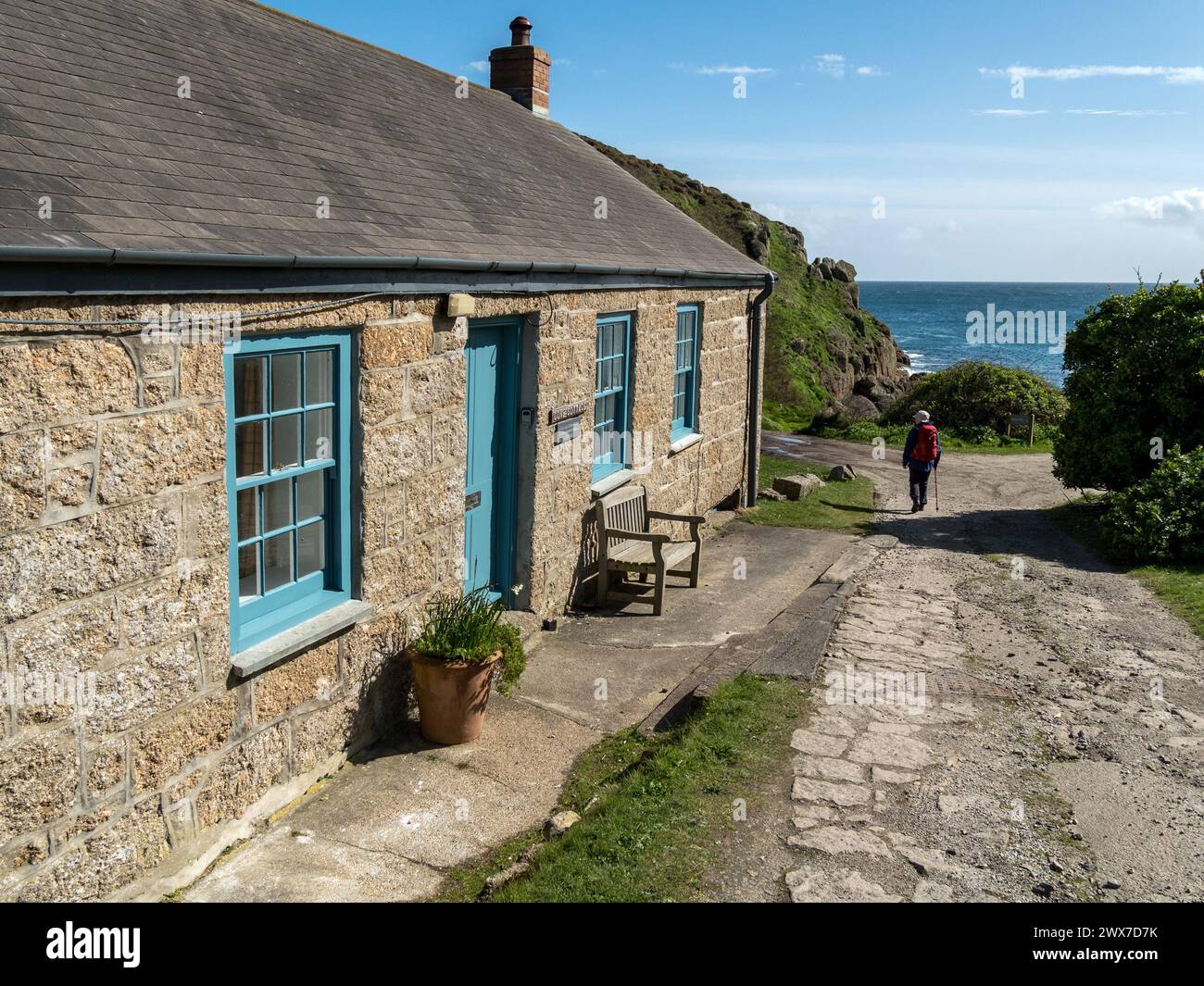 Cove Cottage, an old Cornish granite stone cottage with blue wooden ...