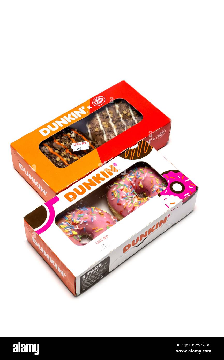 Dunkin' Donuts, Box of donuts isolated on a white studio background ...