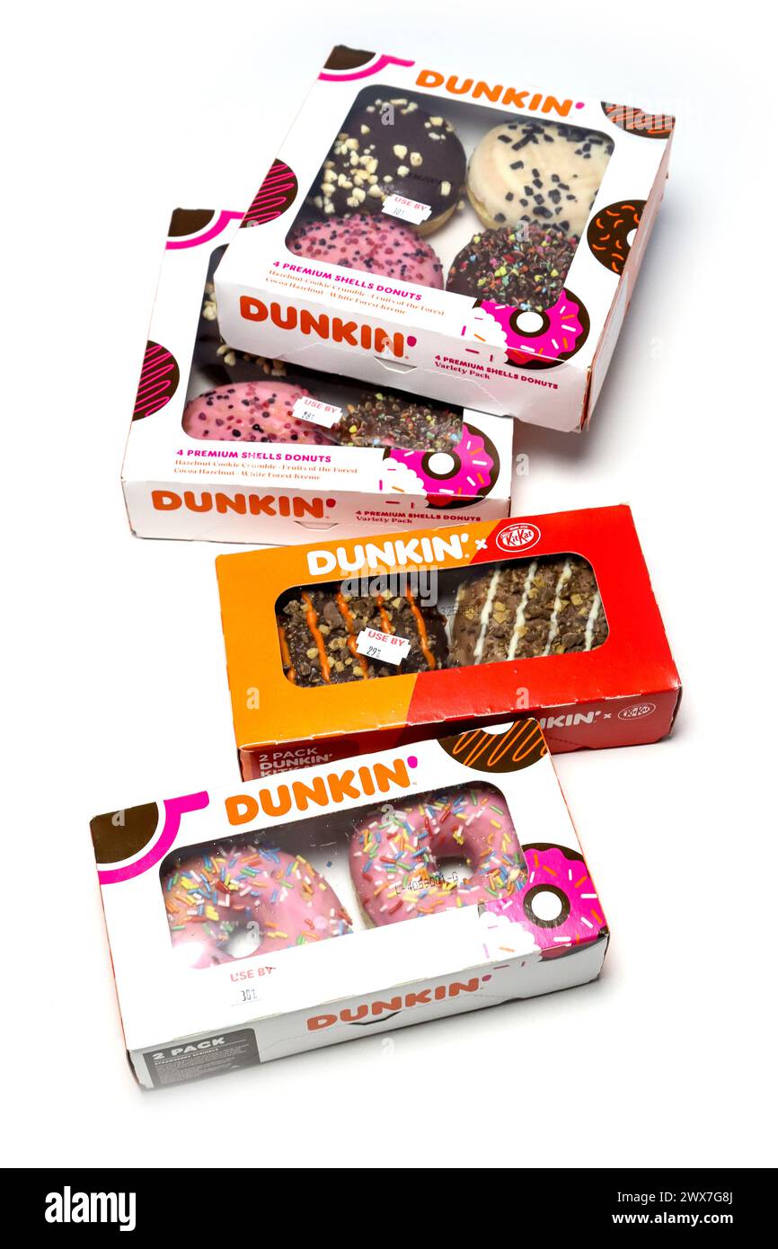 Dunkin' Donuts, Box of donuts isolated on a white studio background ...