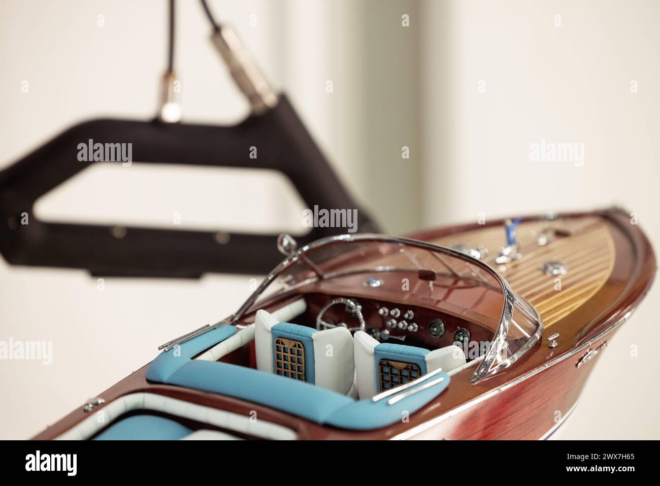Side view of a two tone vintage Italian speedboat isolated on a white ...