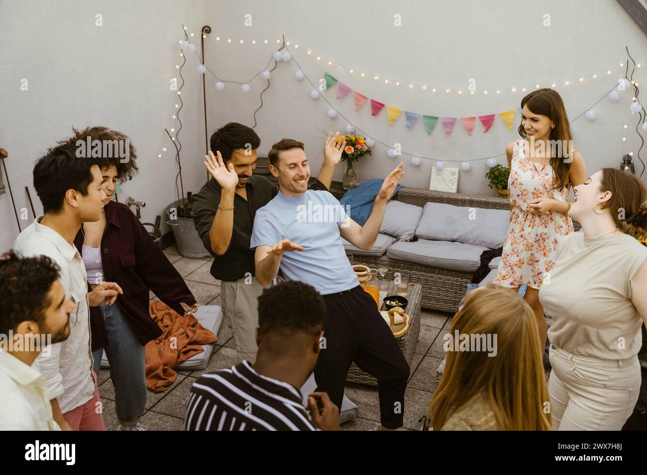 Group young people dancing high hi-res stock photography and images - Alamy