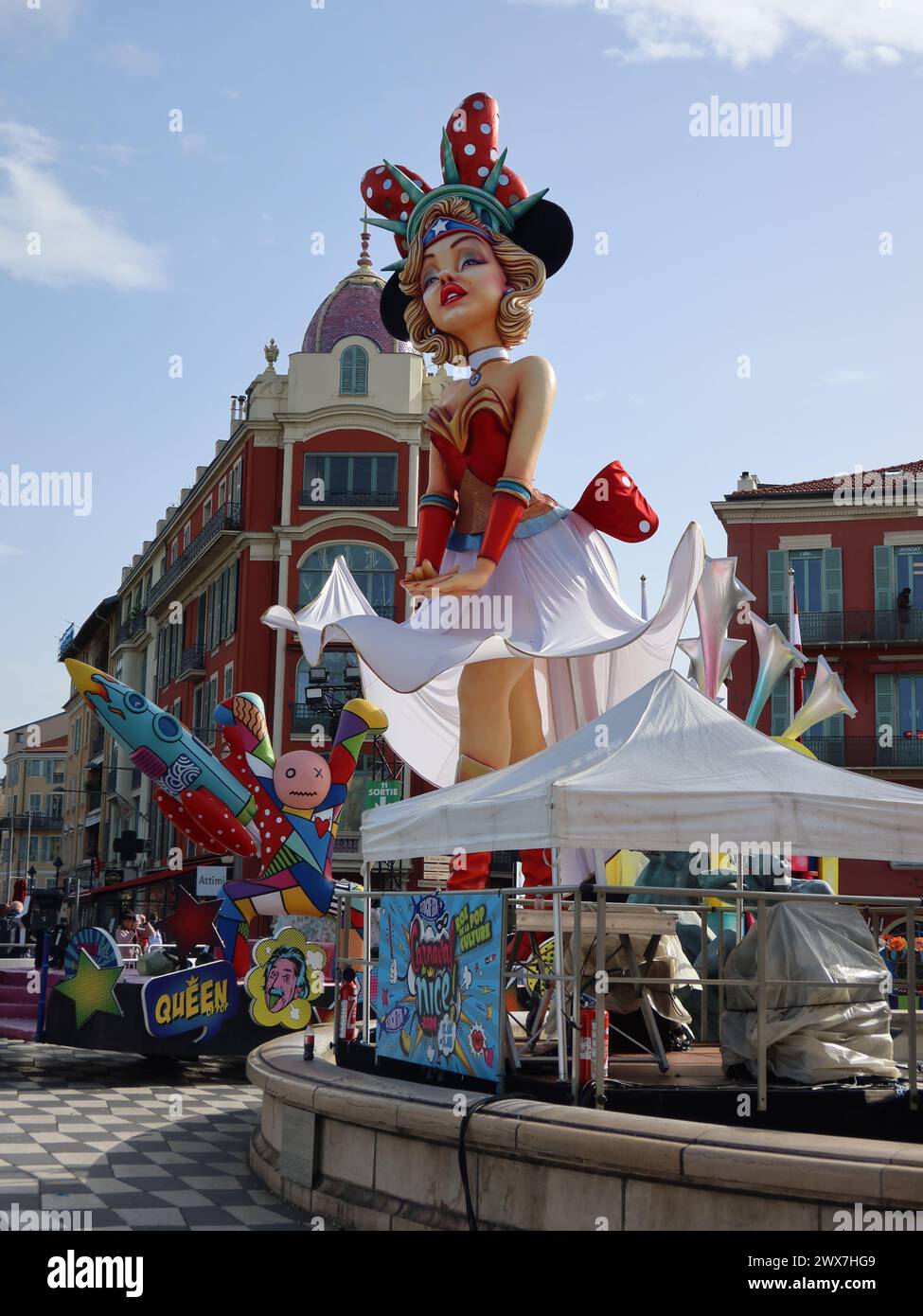 The traditionally grotesque giant puppet of the Queen is Marilyn Monroe ...