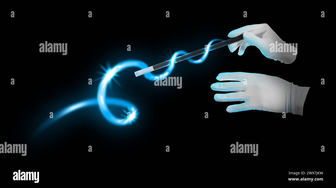 Magician with magic wand performing trick on black background, closeup ...