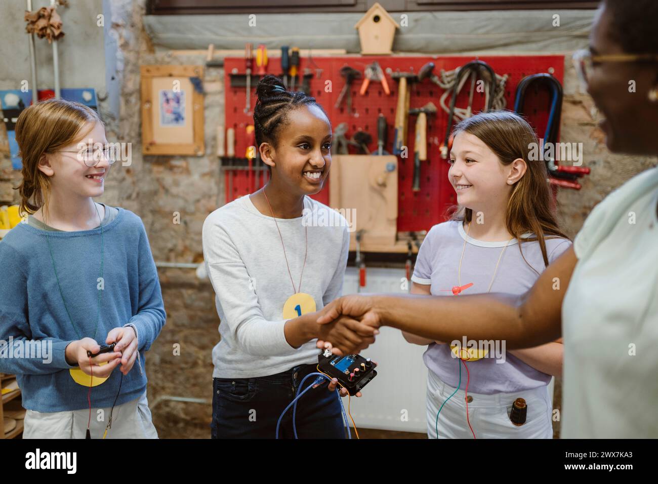 Handshake adult school child hi-res stock photography and images - Alamy