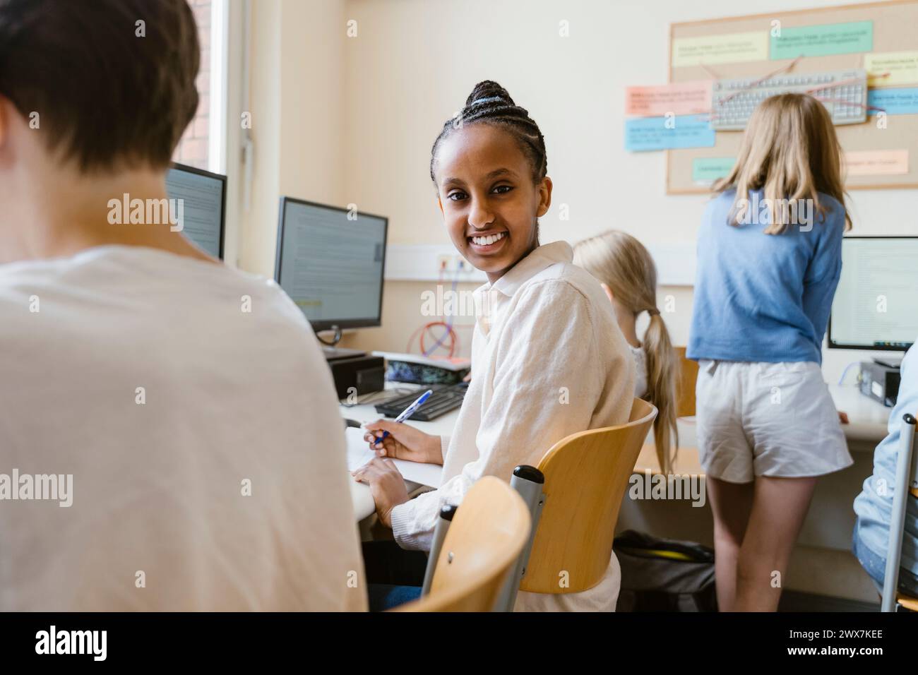 Side view smiling middle school girl hi-res stock photography and ...