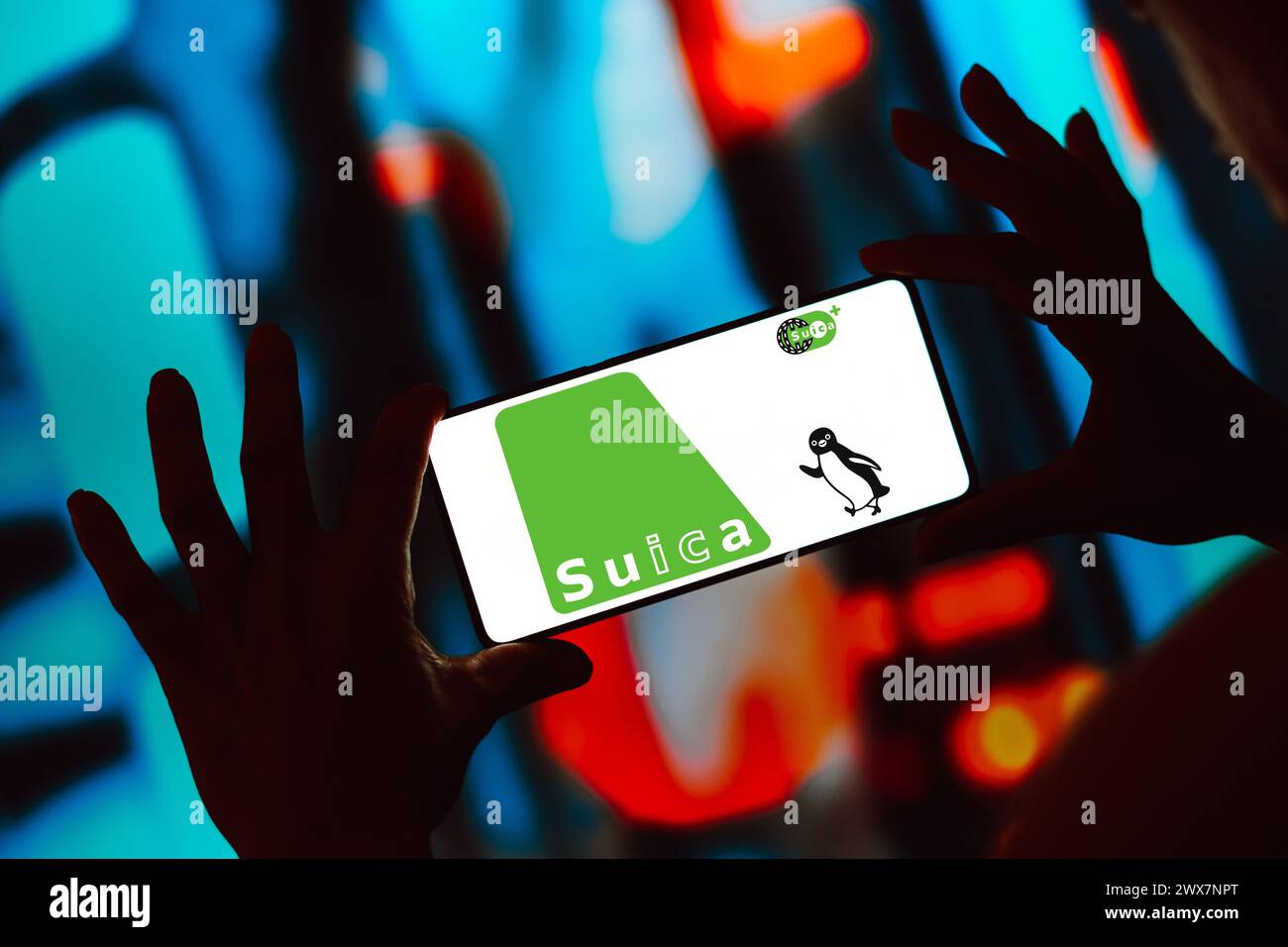 In this photo illustration, the Suica Card logo is displayed on a ...