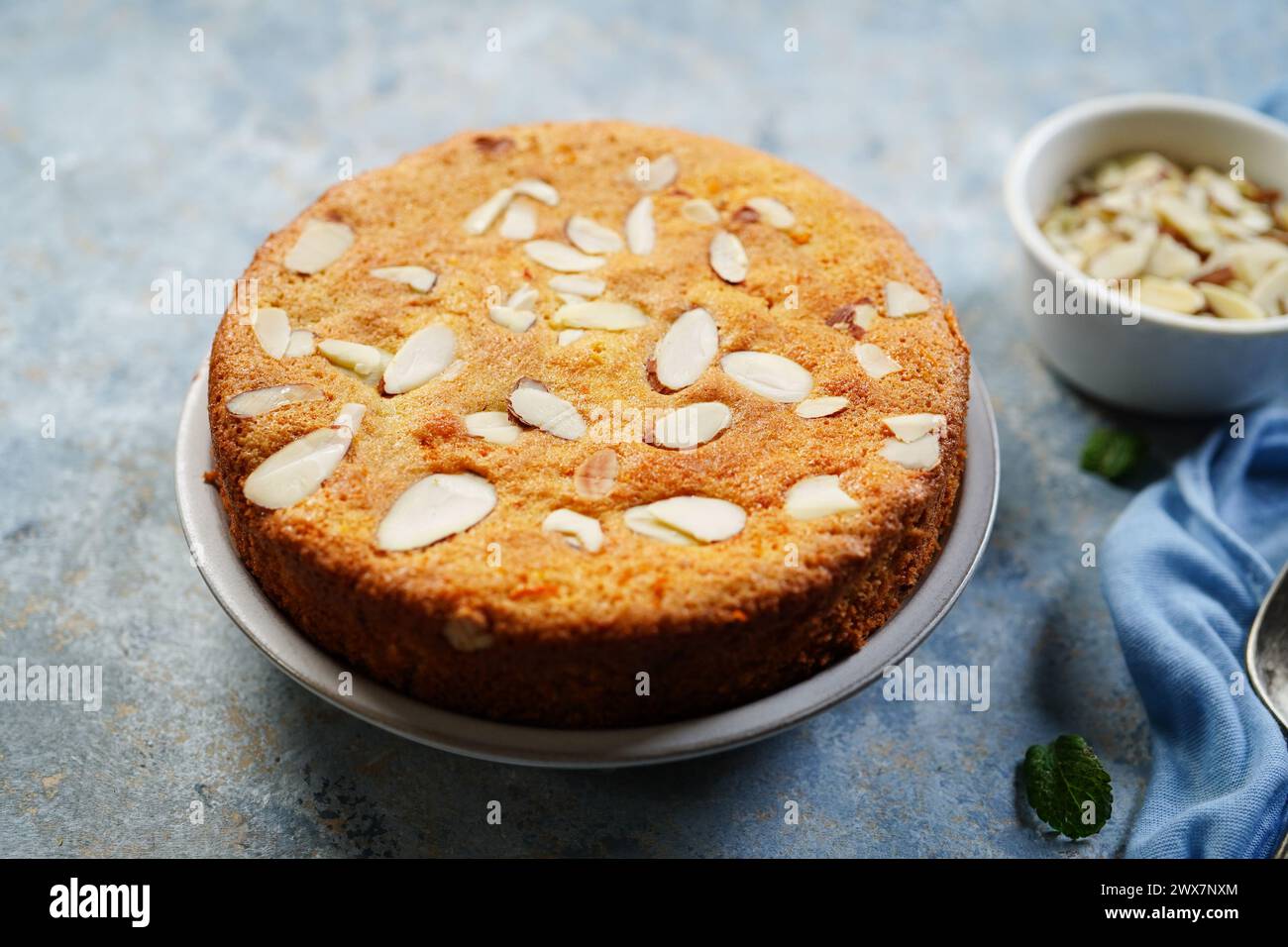 Homemade gluten free Almond meal cake topped with chocolate ganache ...