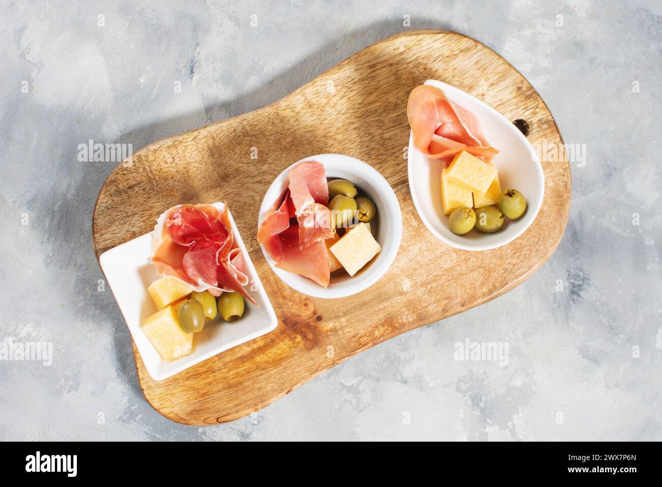 Traditional spanish jamon and cheese. Antipasto plate and olives. Top ...