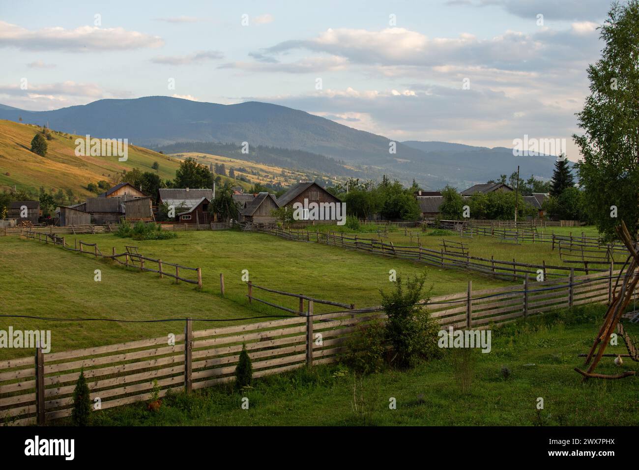 Traditional ukrainian houses in mountain village in summer. Mountain ...