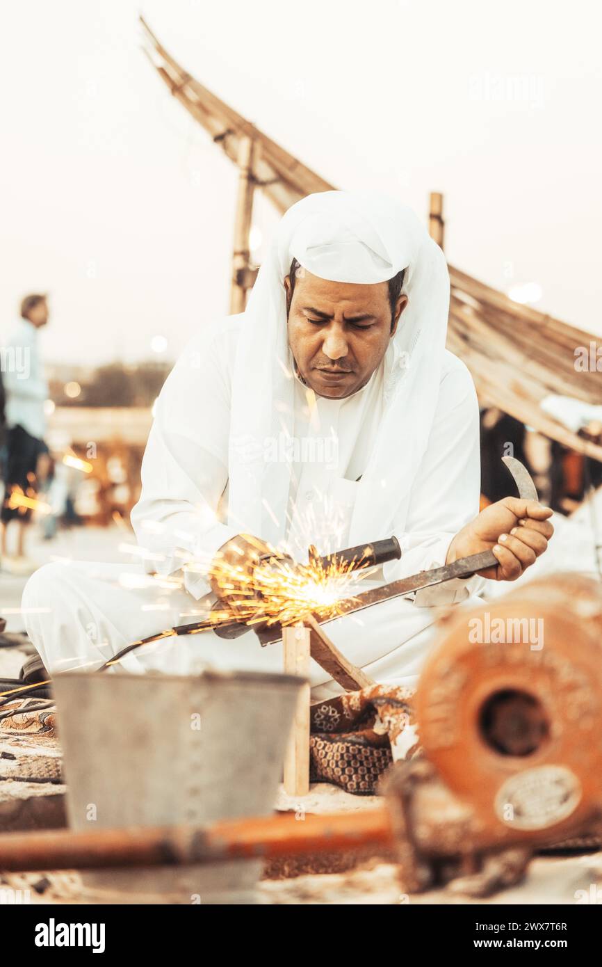 A traditional Arabic blacksmith in katara cultural village, Doha Qatar ...