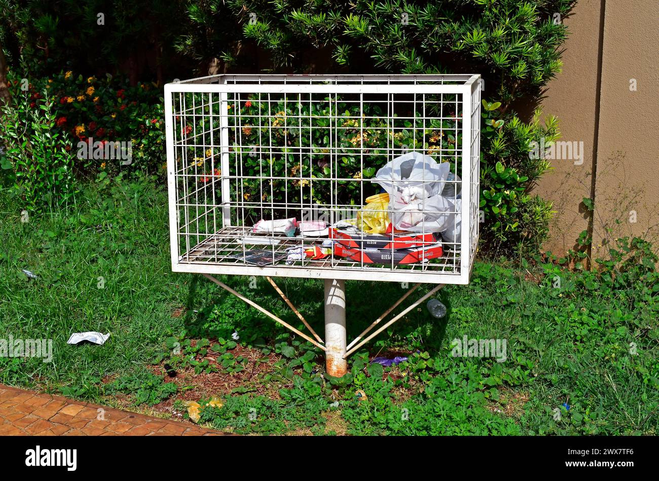 RIBEIRAO PRETO, SAO PAULO, BRAZIL - January 2, 2024: Grid trash can on ...