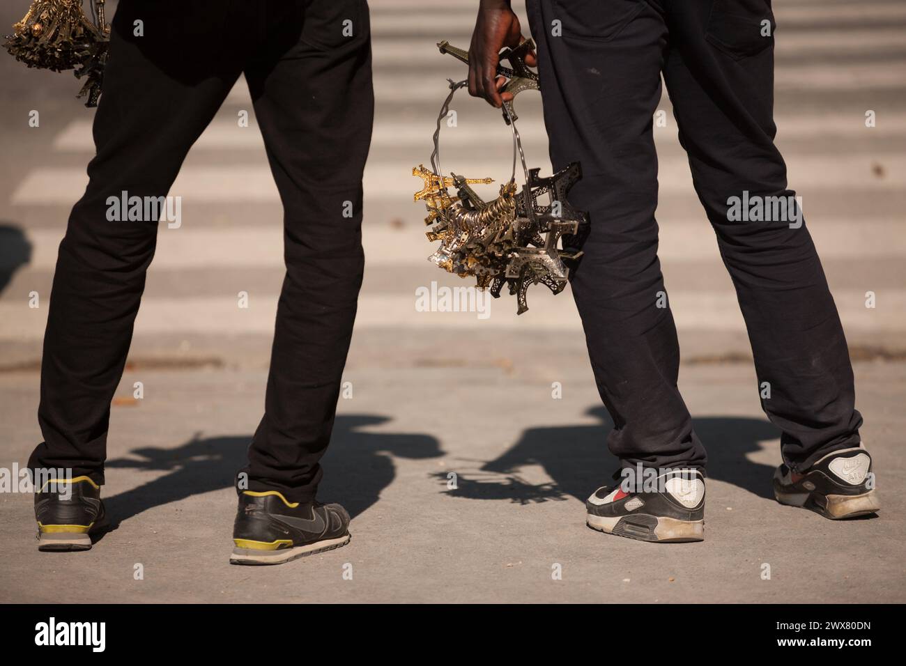Paris, Eiffel Tower, street peddler, hawker Stock Photo - Alamy