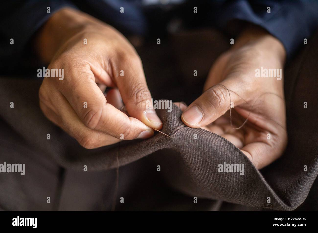 Bespoke tailoring hi-res stock photography and images - Alamy