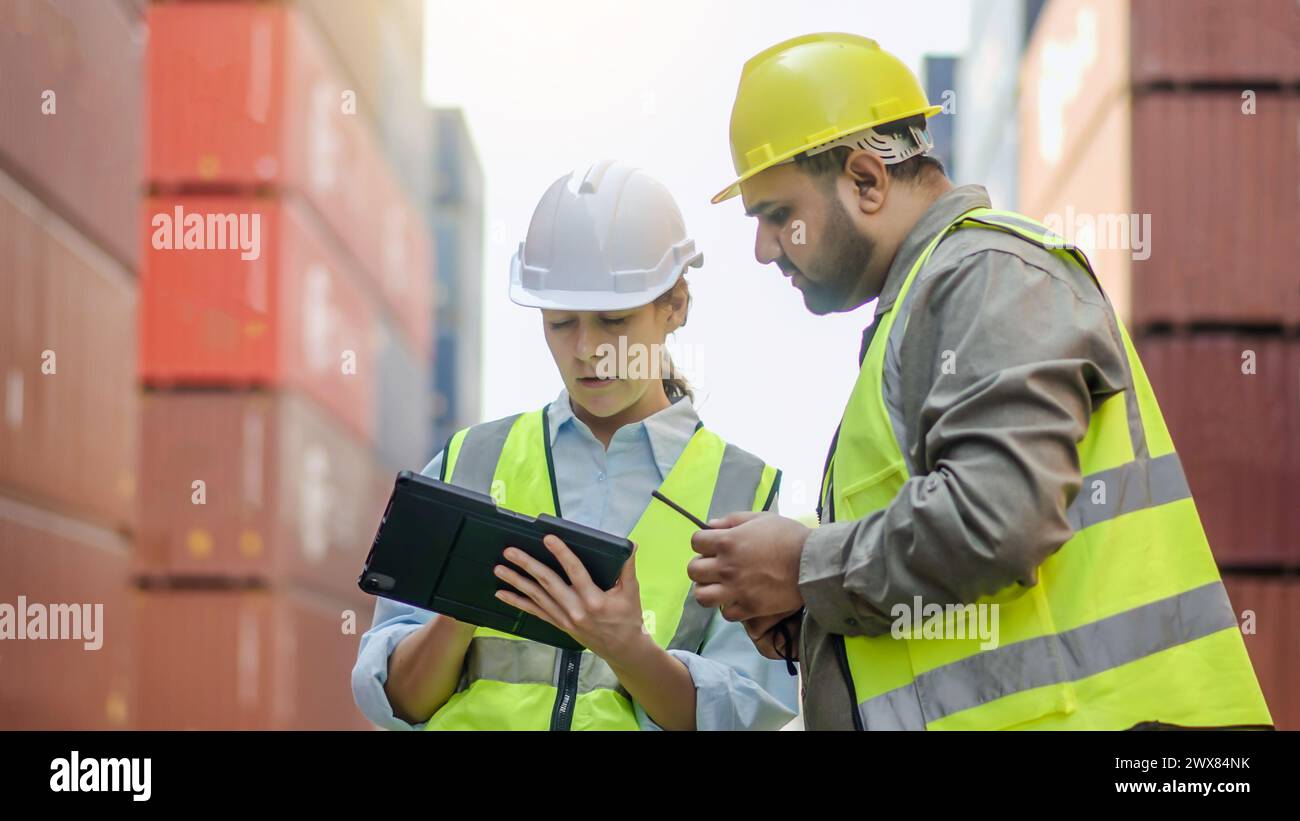 Two individuals using a modern gadget together Stock Photo - Alamy