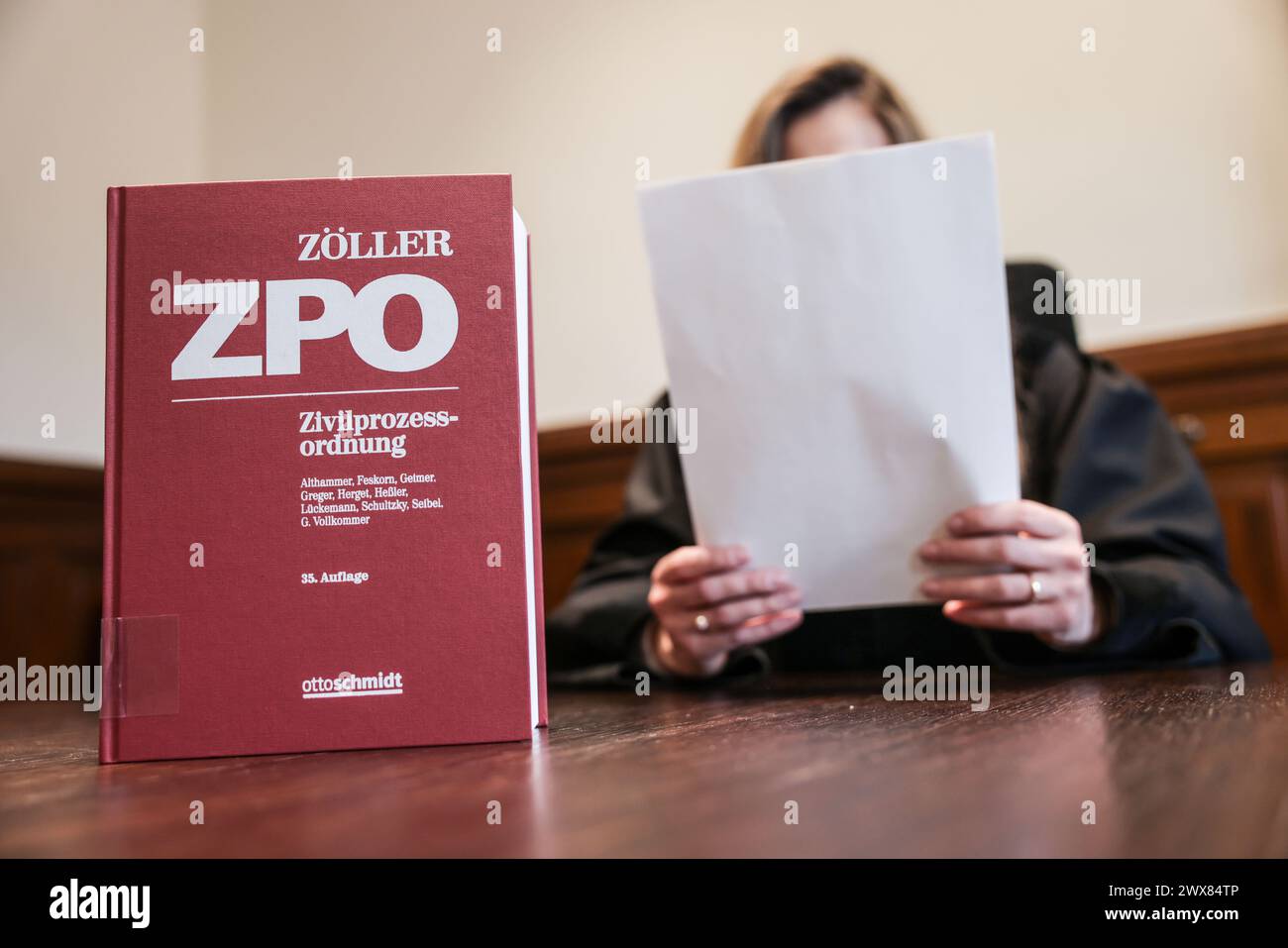 Cologne, Germany. 21st Mar, 2024. A code of civil procedure (ZPO) is on ...