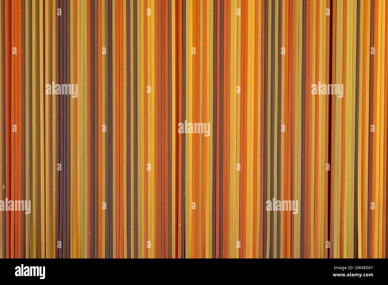 Food background, colorul dried pasta spaghetti, paralleled lines ...