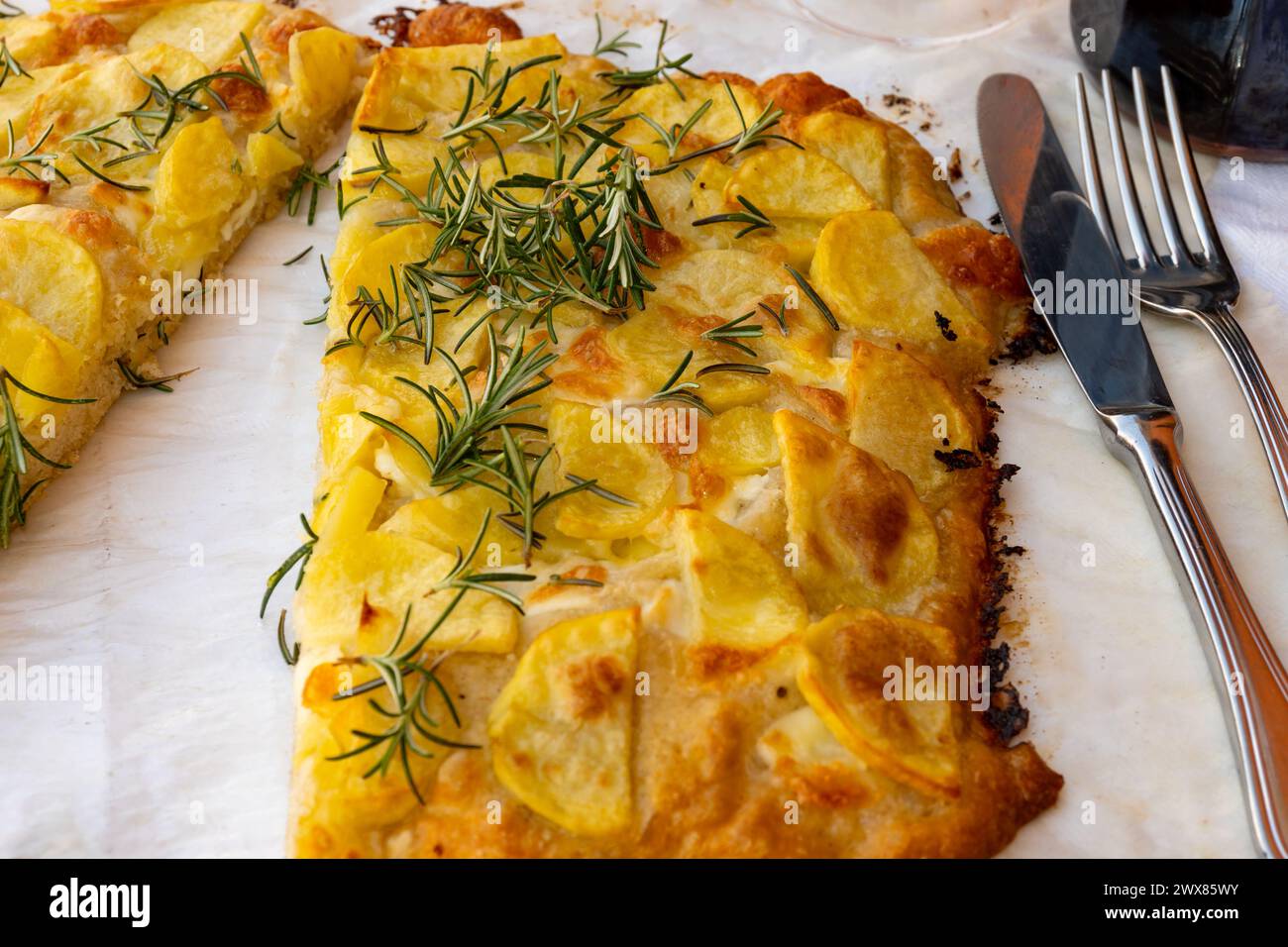 Fresh baked focaccia, pala romana pizza with potato vegetables and ...