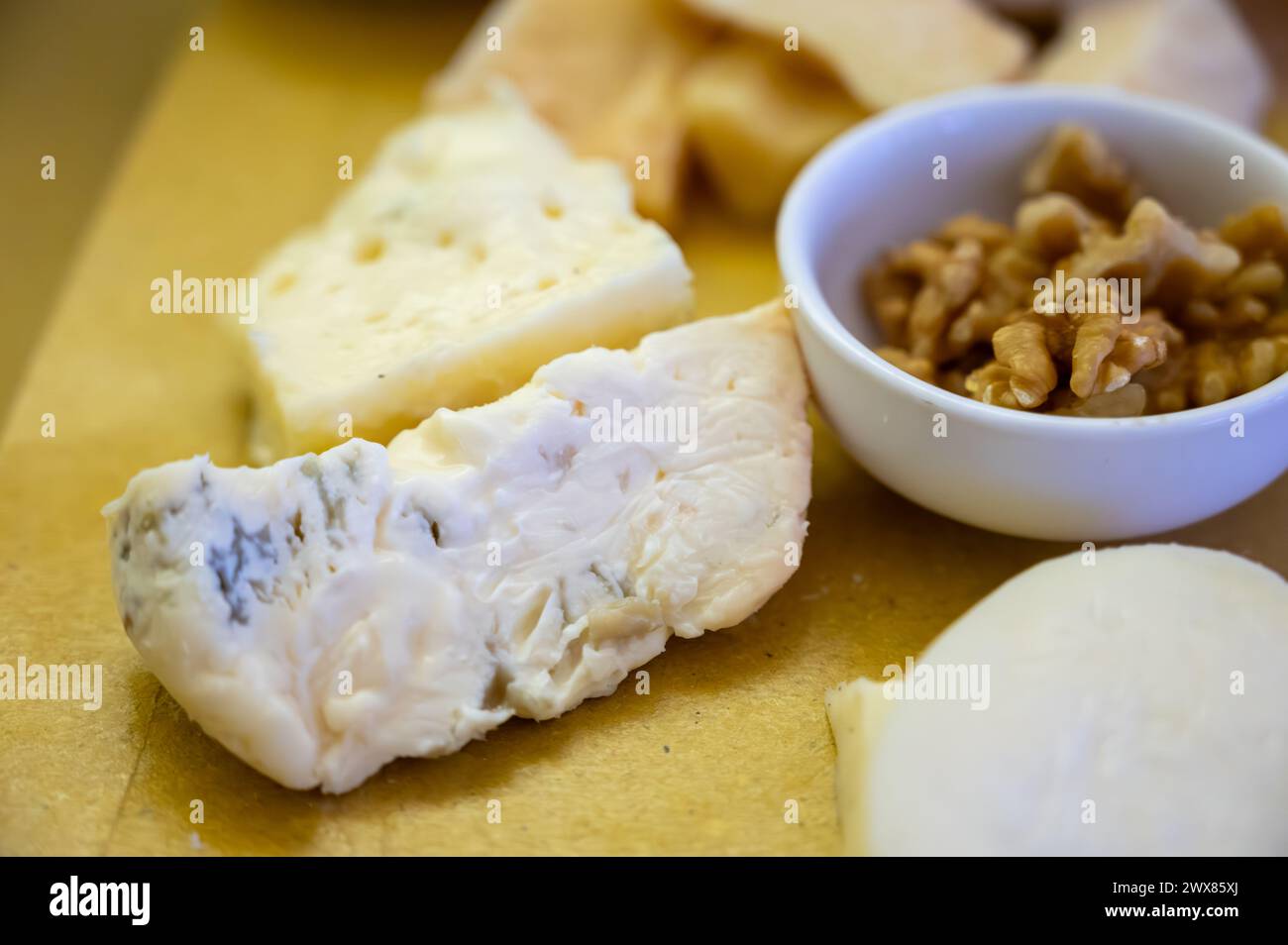Cheese tasting, piece of italian blue cheeses gorgonzola dolce and ...