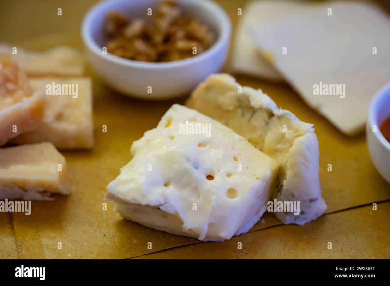 Cheese tasting, piece of italian blue cheeses gorgonzola dolce and ...