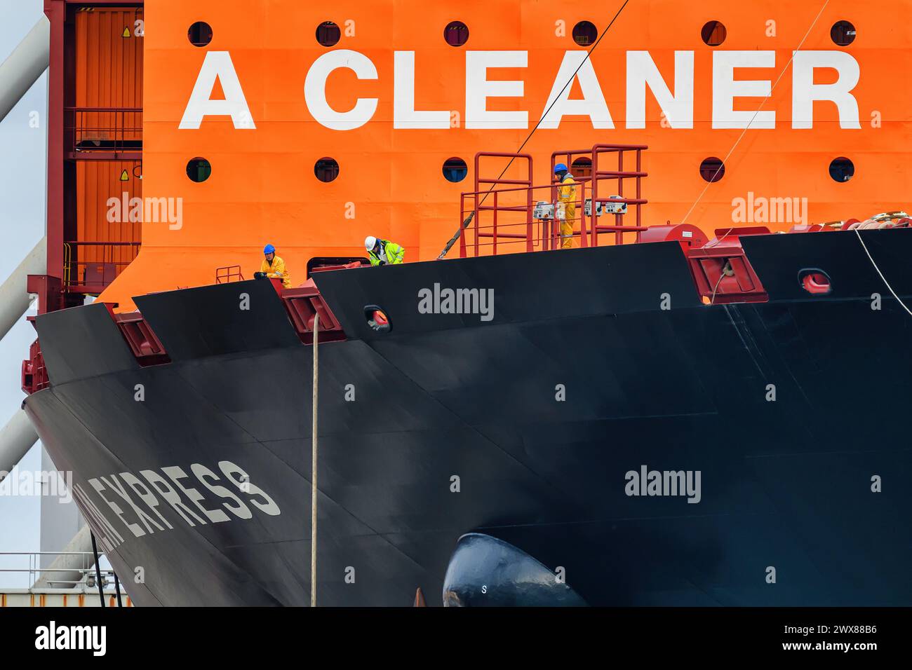 The crew of a container ship during berthing operations on arrival in ...