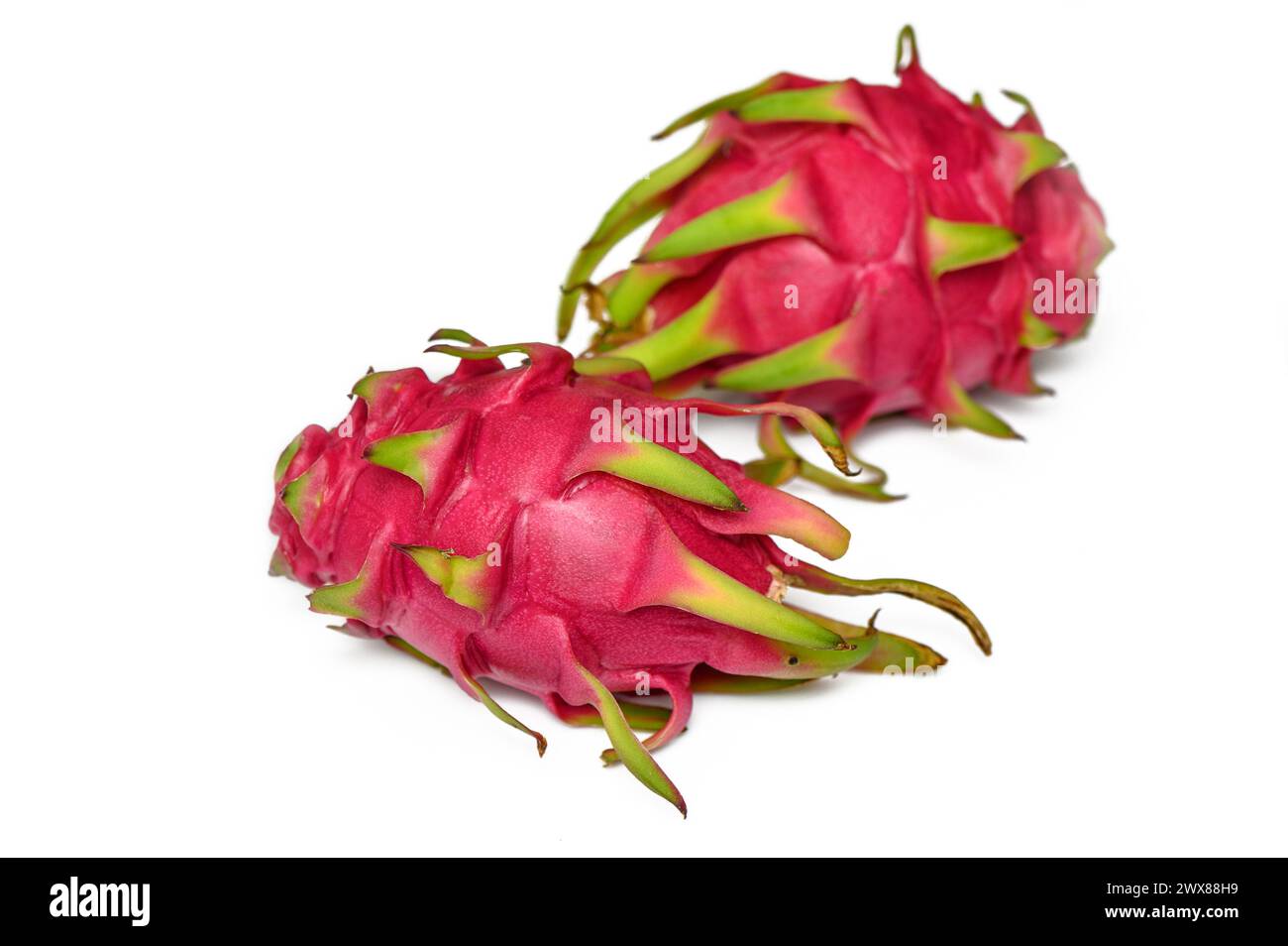 One whole dragon fruit isolated on white background, full depth of ...
