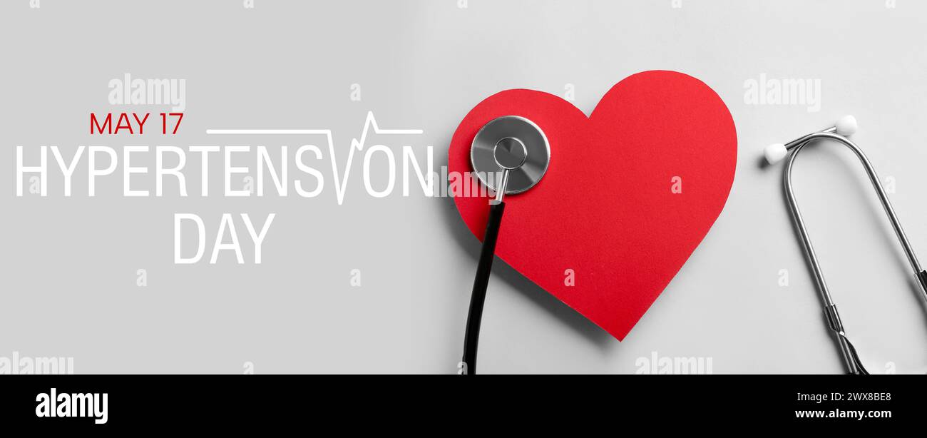 Stethoscope and red heart on light background. Banner for World ...